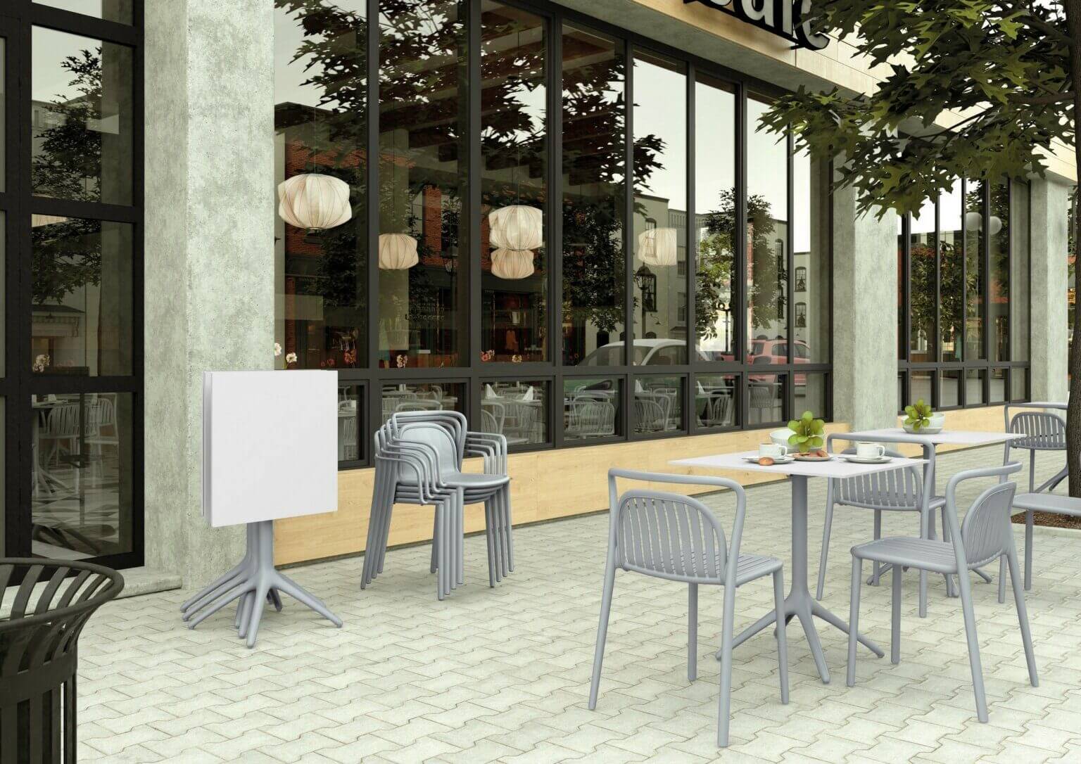Table design pour restaurant en extérieur avec plateau rabattable